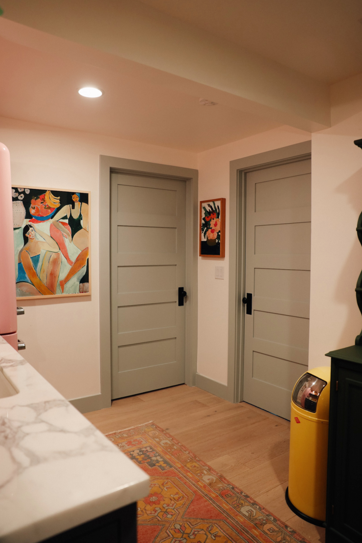 Basement Pink Walls, Painted Blue Doors, and Decorative Vent Cover ...